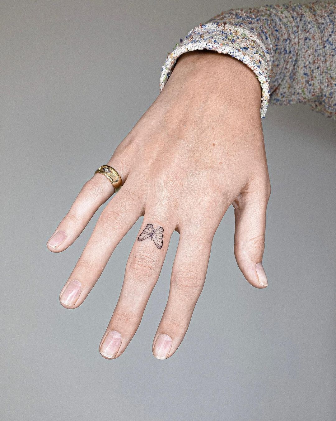 From Dainty To Daring: 21 Cute Finger Tattoo Ideas To Try