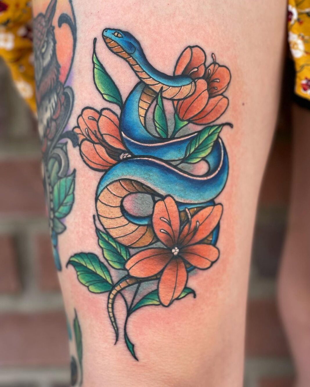 An Ode To Your Bravery: 24 Snake With Flowers Tattoo Designs