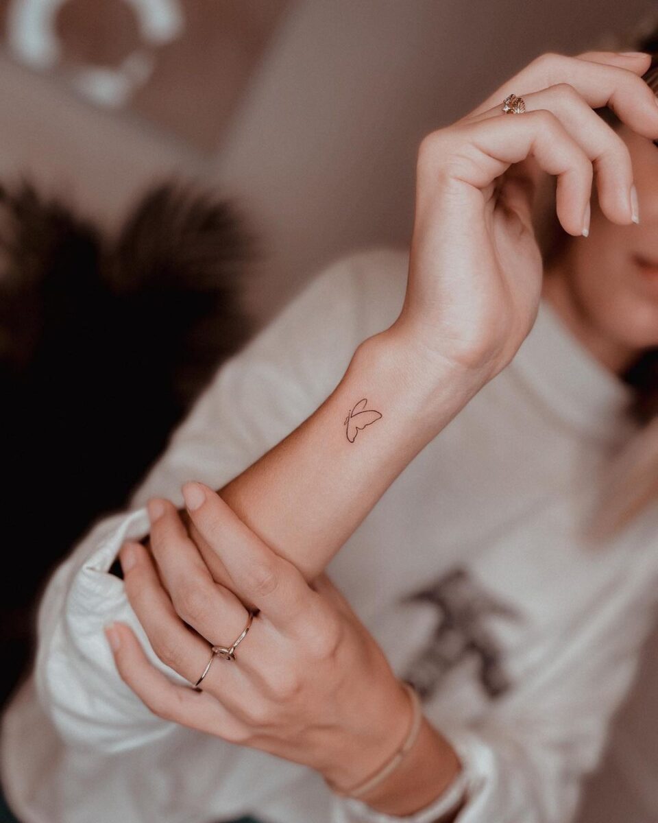 24 Tiny Hand Tattoos For The Modern Minimalist