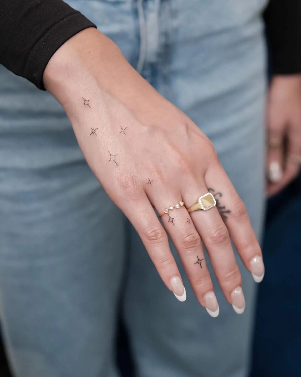 24 Tiny Hand Tattoos For The Modern Minimalist