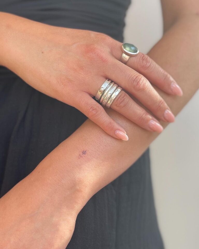 24 Tiny Hand Tattoos For The Modern Minimalist