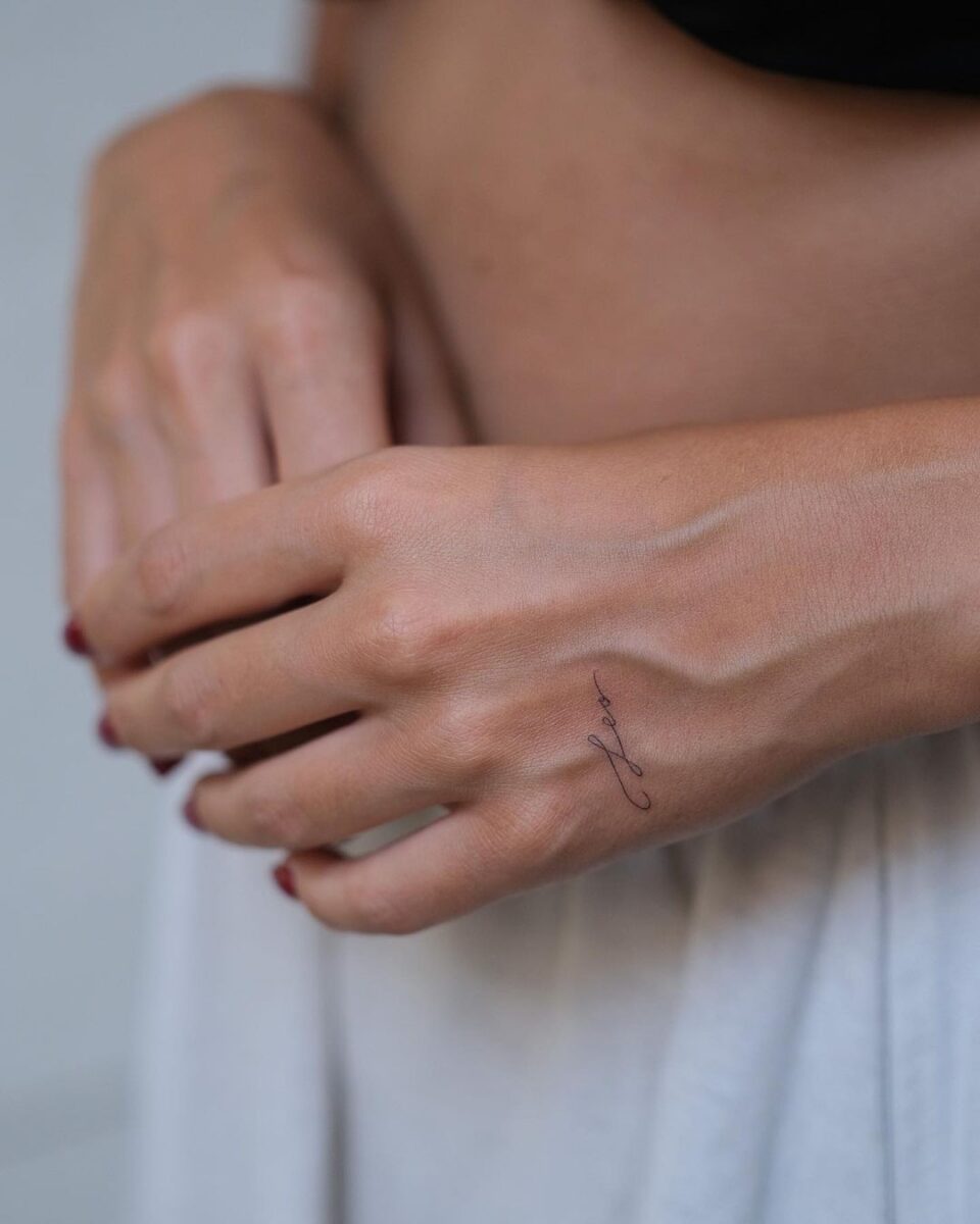 24 Tiny Hand Tattoos For The Modern Minimalist
