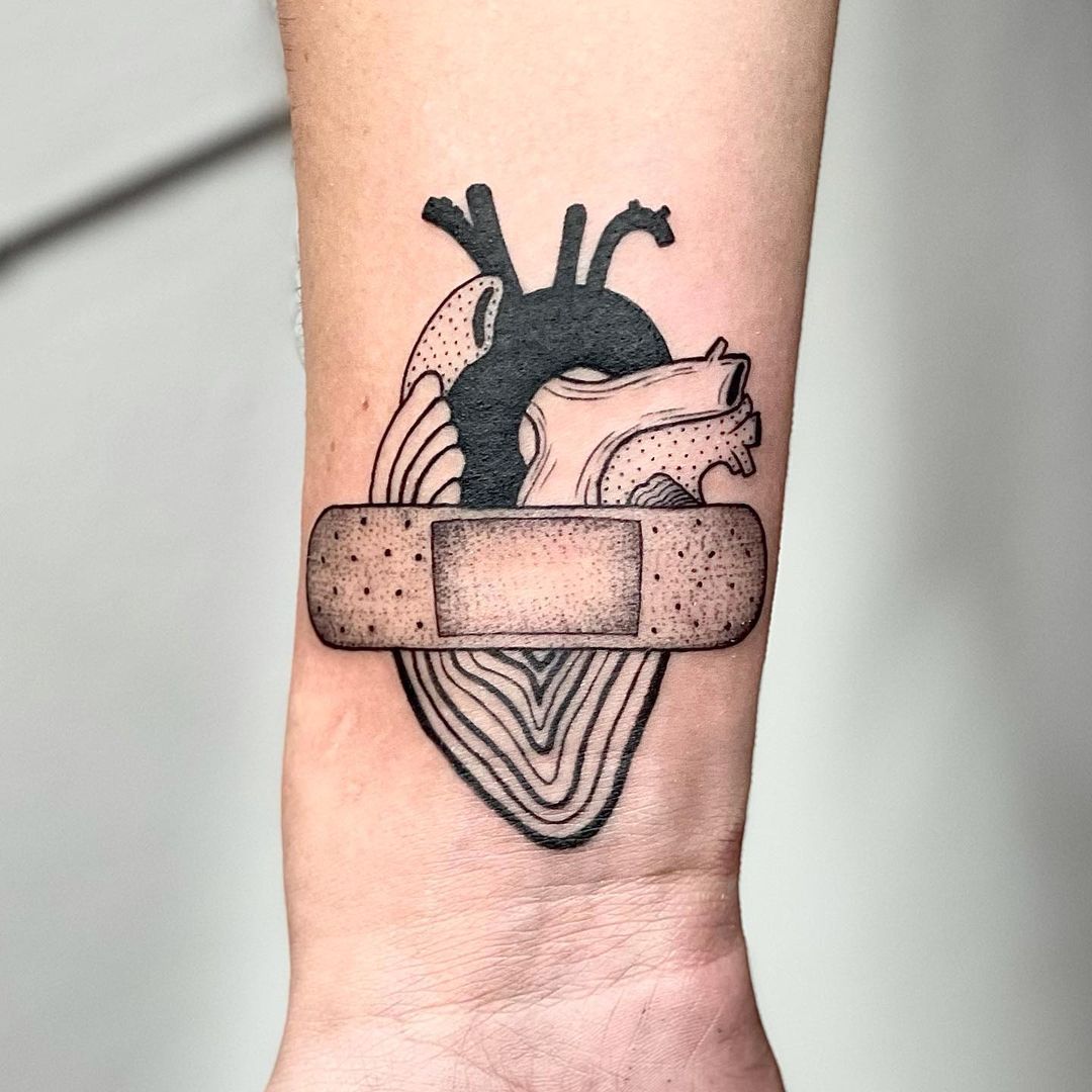25 Heartbreak Tattoo Ideas To Share Your Feelings