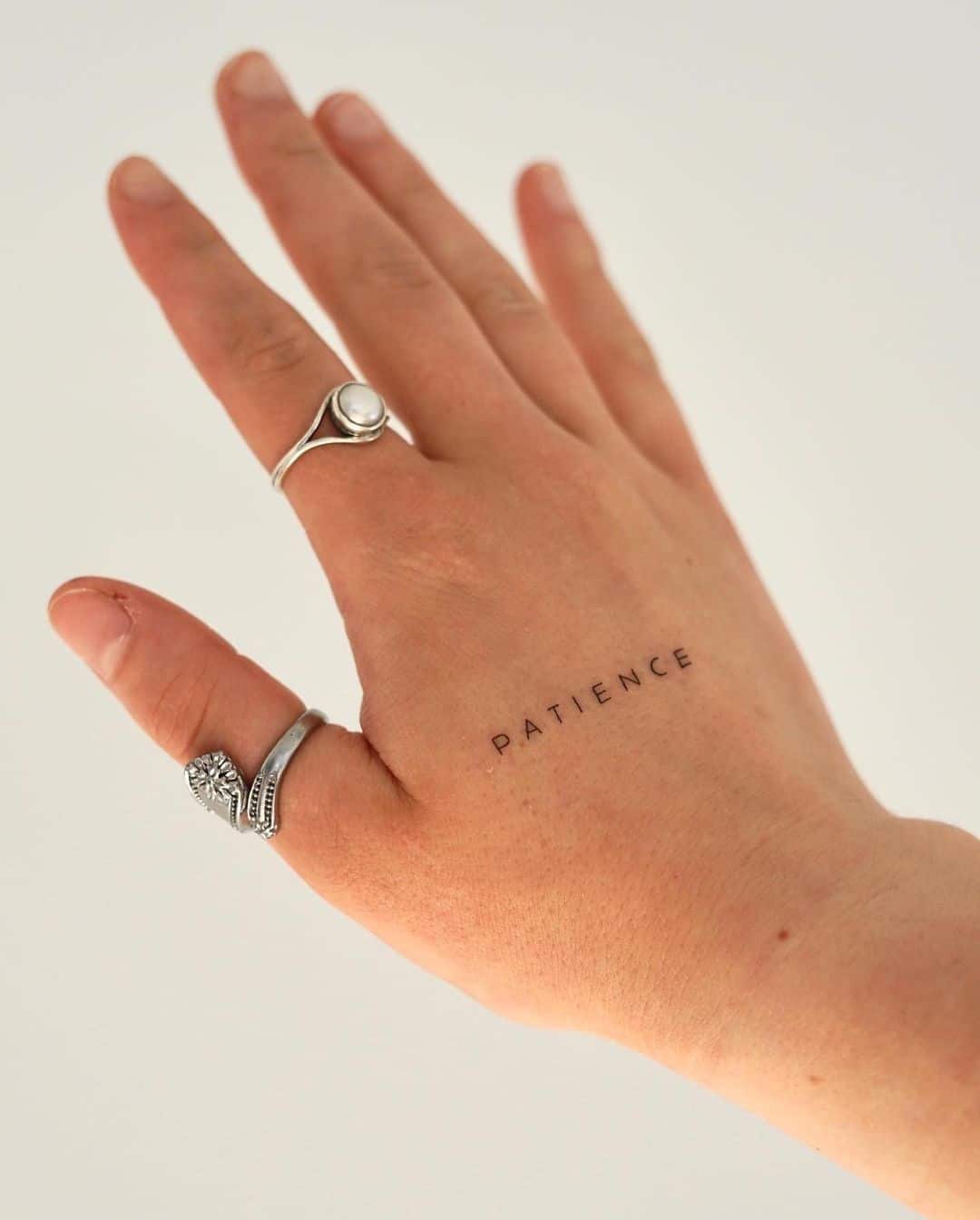 26 One-Word Tattoos That Attest To The Power Of Simplicity