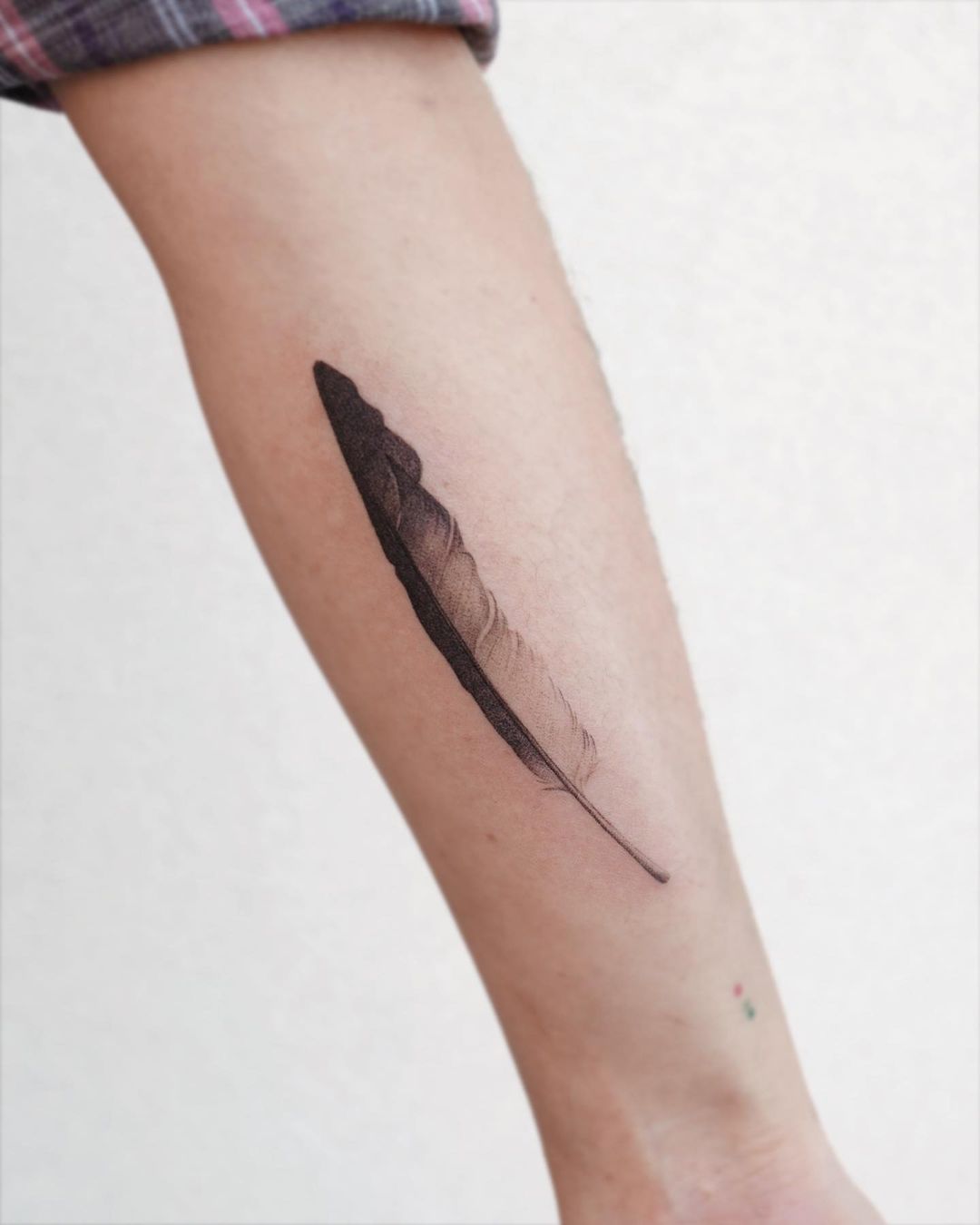 Simple And Symbolic, 24 Feather Tattoo Ideas To Inspire You