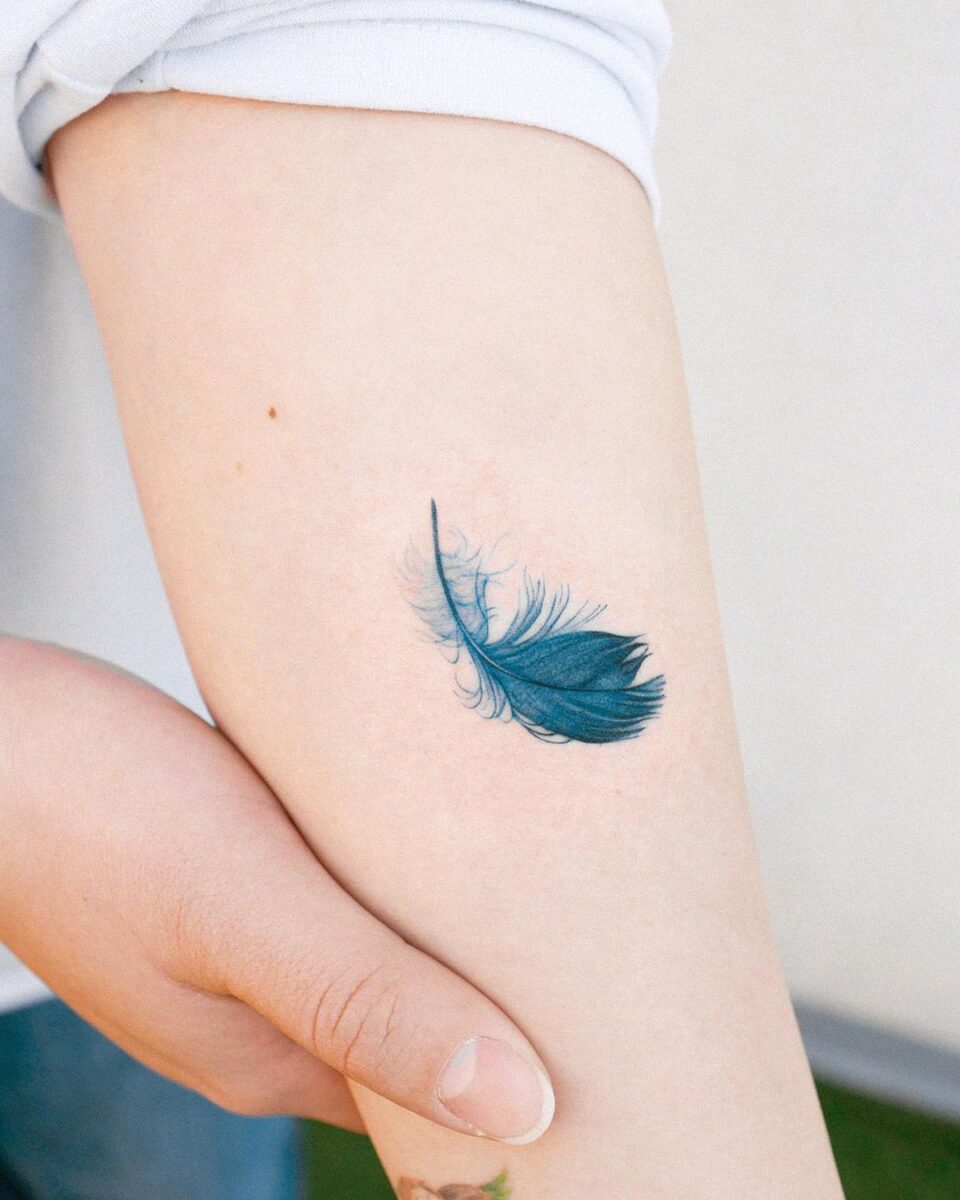 Simple And Symbolic, 24 Feather Tattoo Ideas To Inspire You