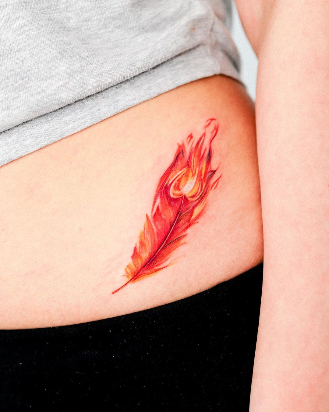 Simple And Symbolic, 24 Feather Tattoo Ideas To Inspire You