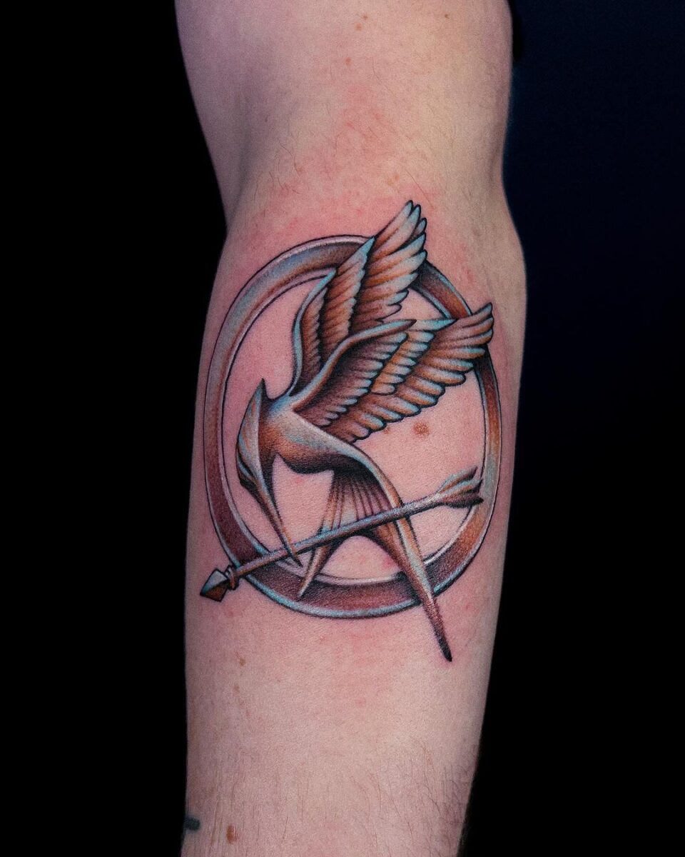 22 Incredible Hunger Games Tattoo Ideas Fit For Die-Hard Fans