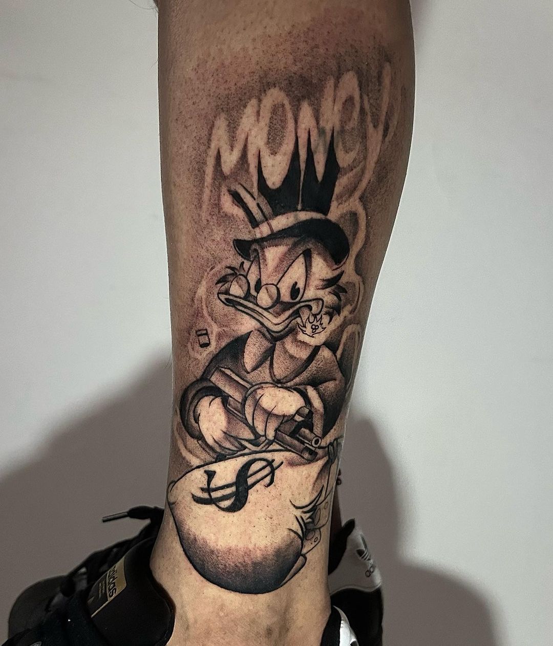 23 High-Quality Money Tattoo Ideas For Prosperity