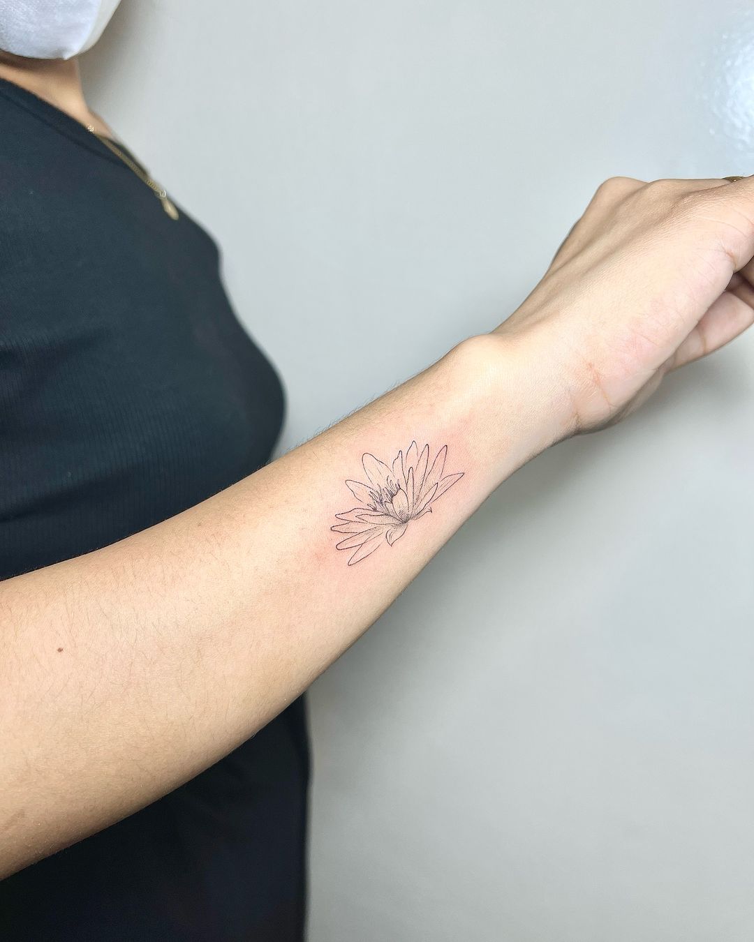25 Enthralling Water Lily Tattoos For A Splash Of Elegance