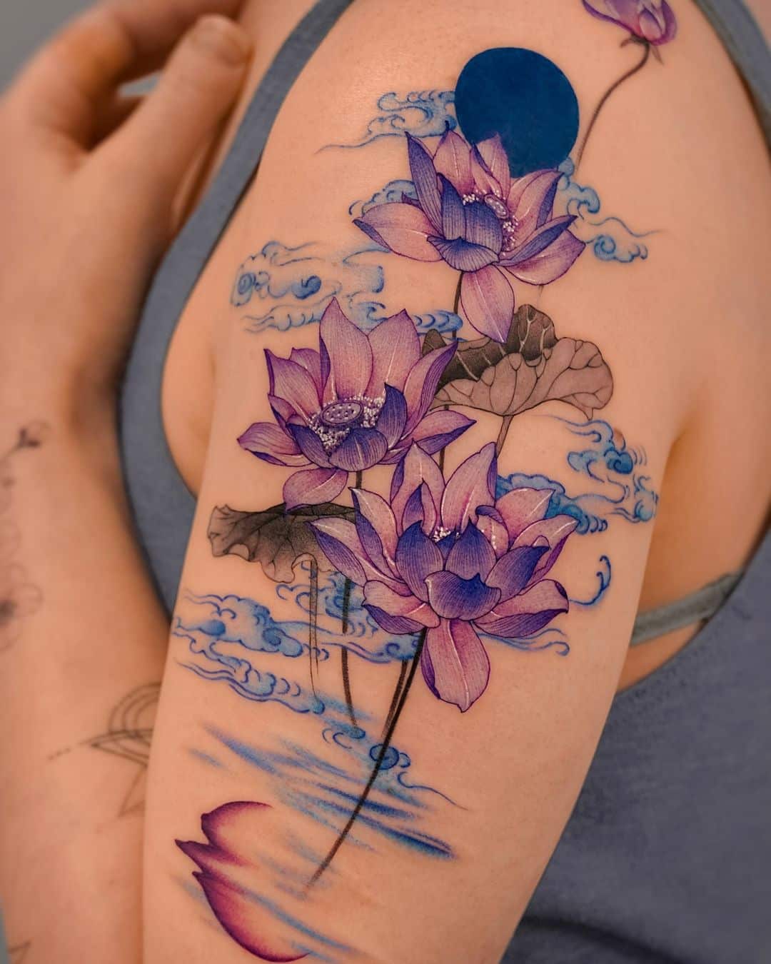 25 Enthralling Water Lily Tattoos For A Splash Of Elegance