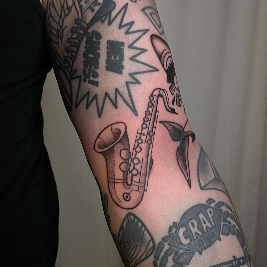 27 Superior Saxophone Tattoos That Hit All The Right Notes