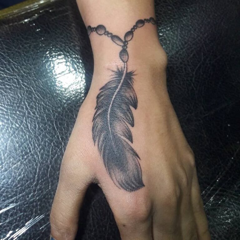18 Elite Feather On Hand Tattoos: Handy Symbols Of Freedom