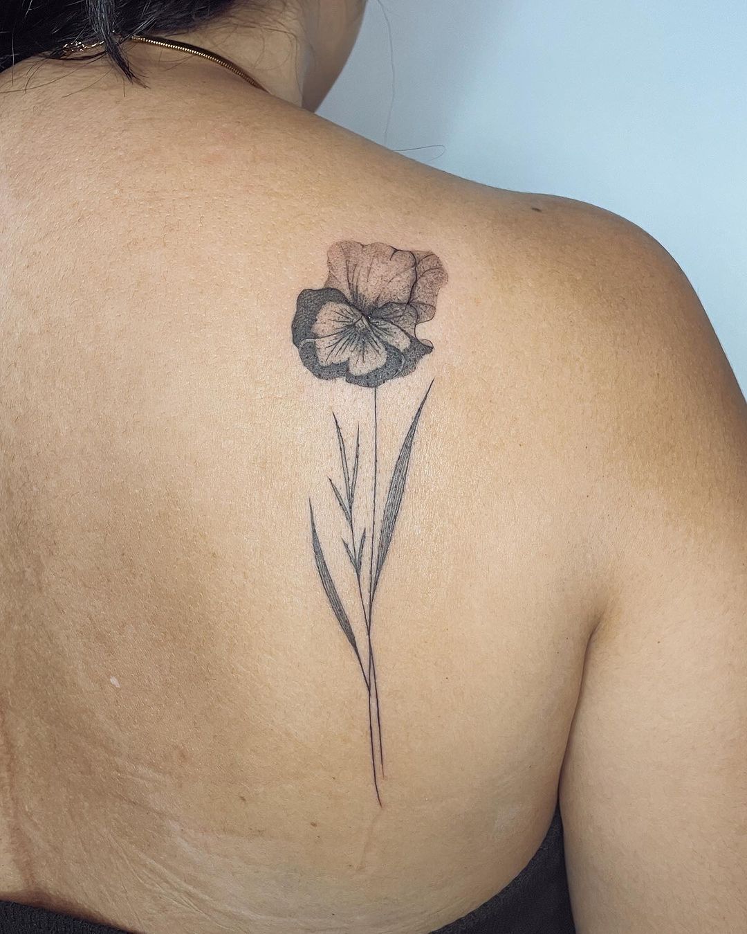 21 Alluring Violet Flower Tattoos For A Delicate Expression
