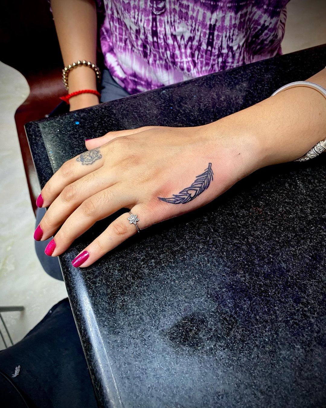 18 Elite Feather On Hand Tattoos: Handy Symbols Of Freedom