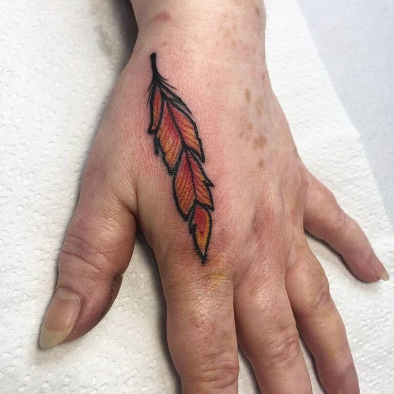 18 Elite Feather On Hand Tattoos: Handy Symbols Of Freedom