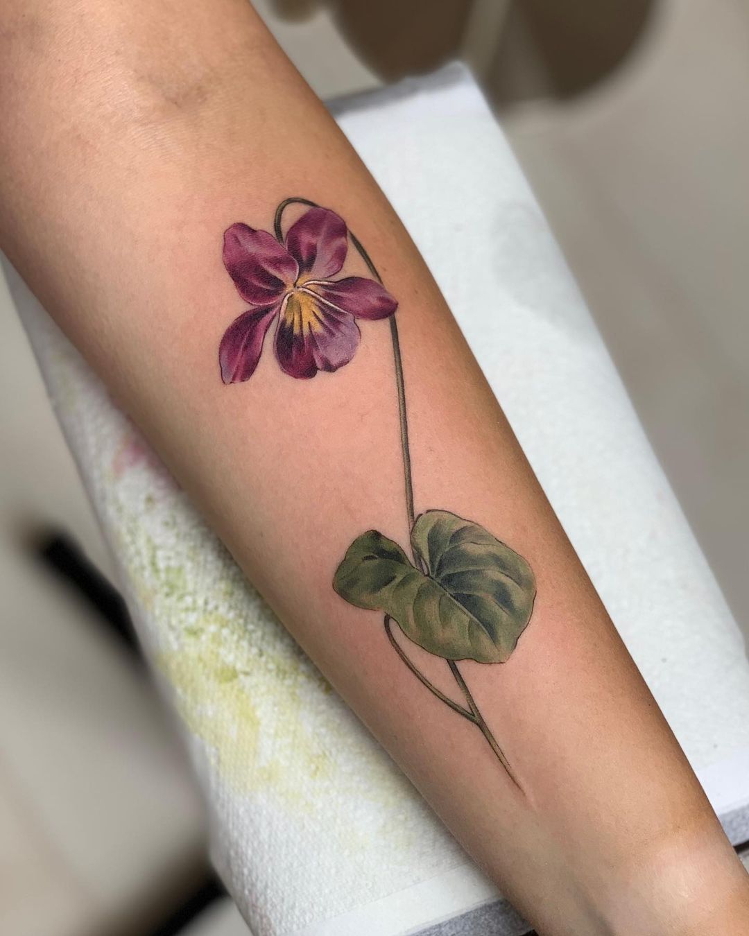 21 Alluring Violet Flower Tattoos For A Delicate Expression