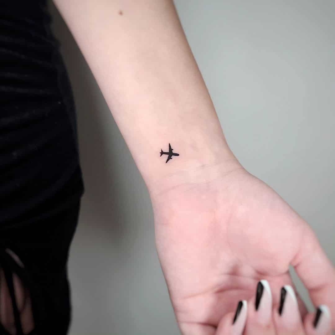 25 Exciting Airplane Tattoo Ideas To Please Your Wanderlust