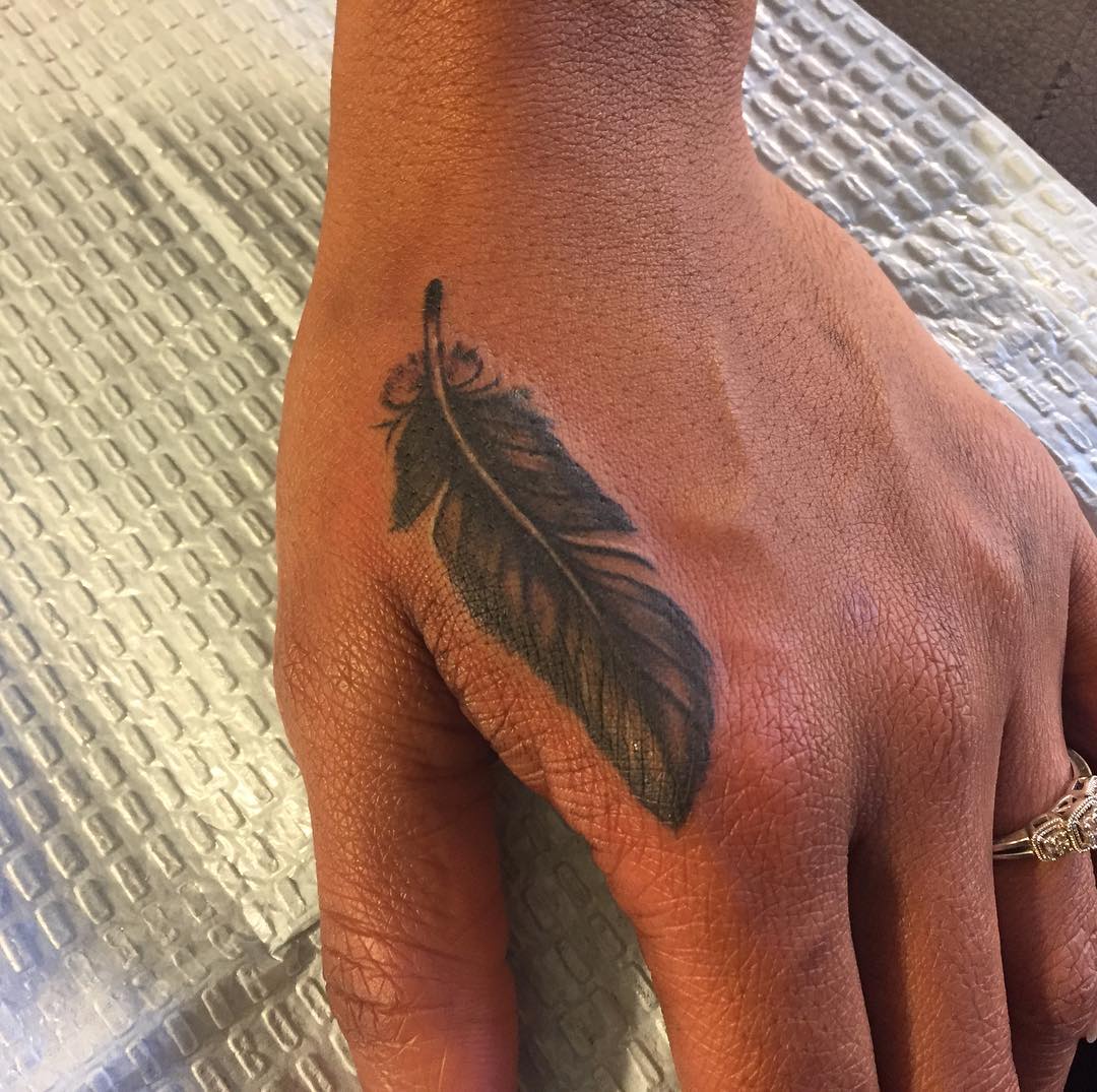 18 Elite Feather On Hand Tattoos: Handy Symbols Of Freedom