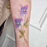 21 Alluring Violet Flower Tattoos For A Delicate Expression