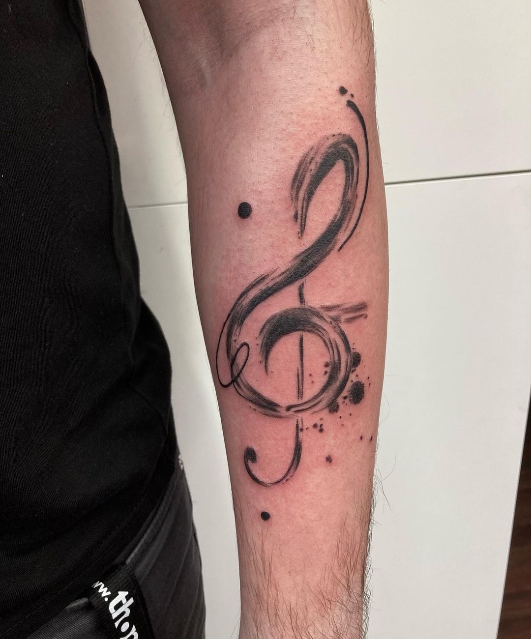 21 Mind-Blowing Music Tattoos That'll Hit The Right Notes