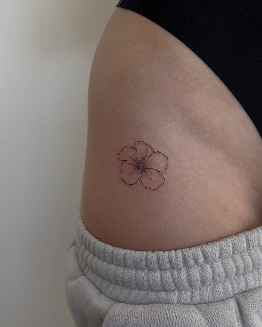 20 Radiant Flower Tattoos That Explore The Beauty Of Nature