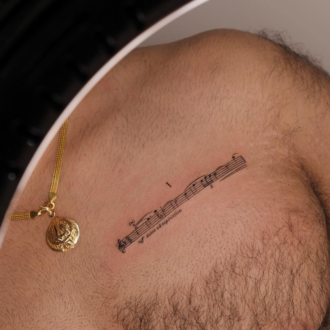 21 Mind-Blowing Music Tattoos That'll Hit The Right Notes