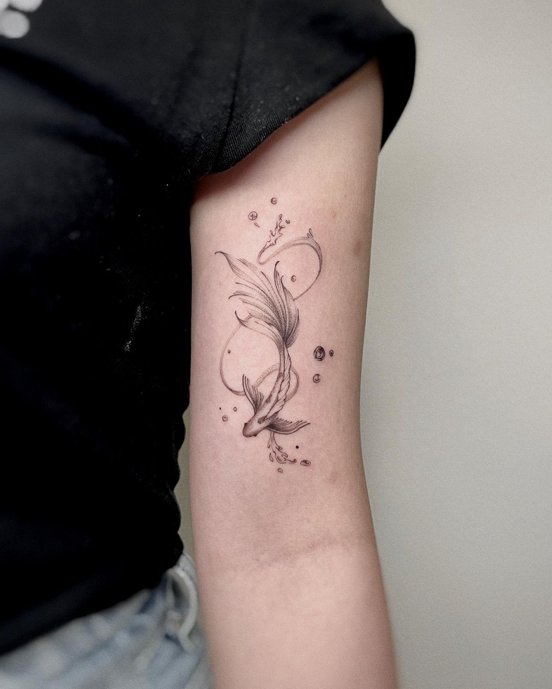 20 Unique Upper Arm Tattoos for Everyone's Taste